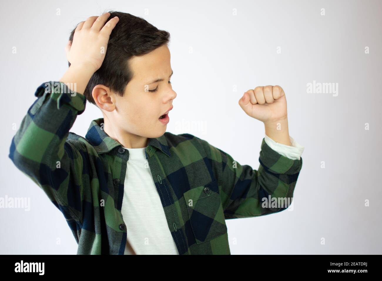 Boy showing okay gesture in sign language on white background Stock ...