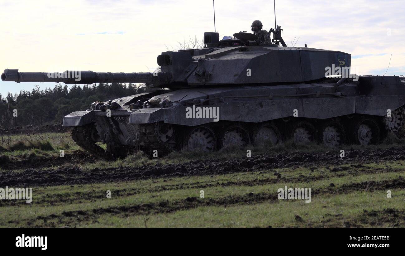 close up of a British Army Challenger 2 main battle tank in action ...