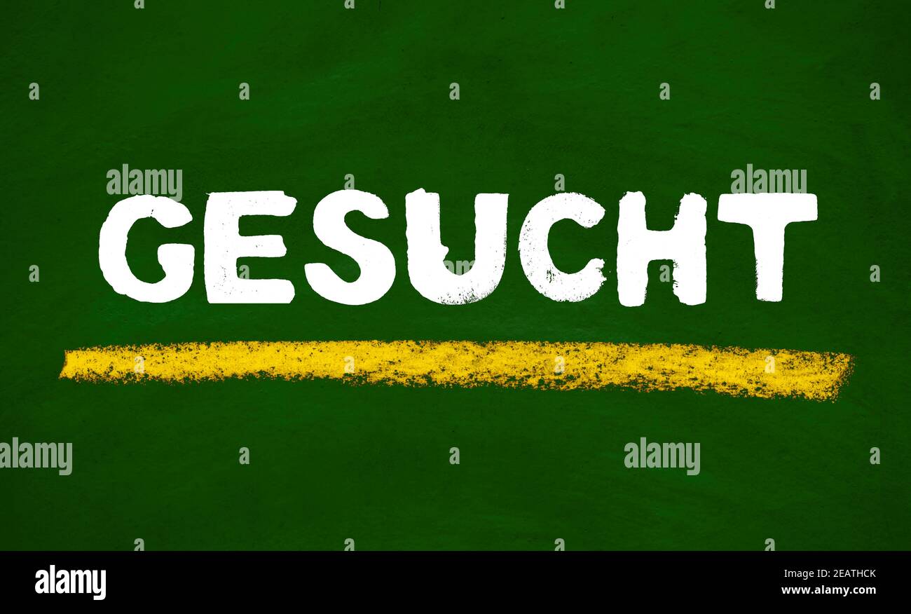 Green chalkboard showing: Wanted in german language Stock Photo - Alamy