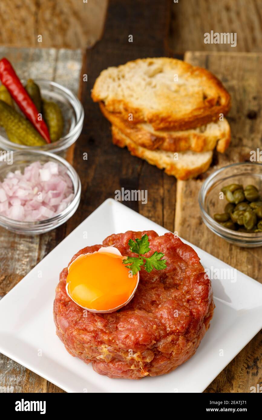 steak tartare with egg Stock Photo - Alamy