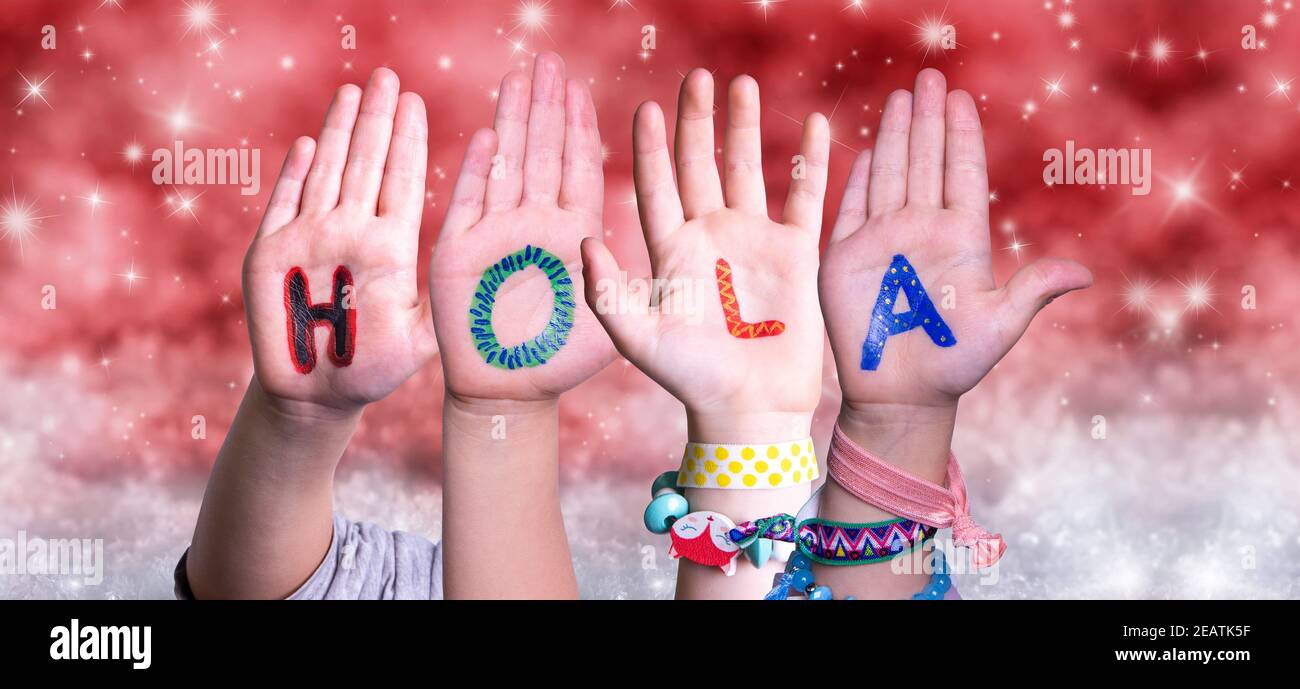 Children Hands Hola Means Hello, Red Christmas Background Stock Photo ...
