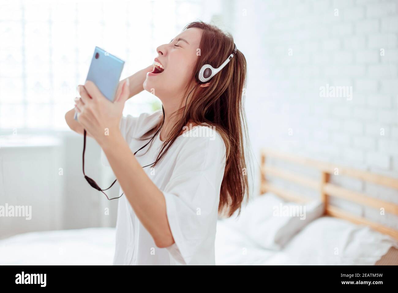 Singing Into Phone High Resolution Stock Photography and Images - Alamy
