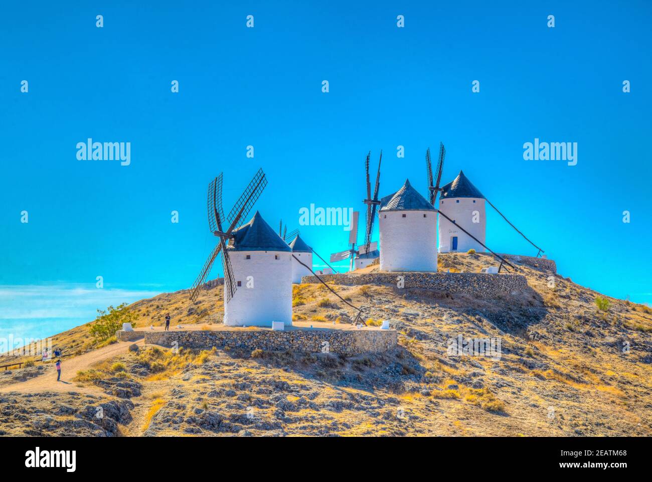 Traditional white windmills at Consuegra in Spain Stock Photo - Alamy
