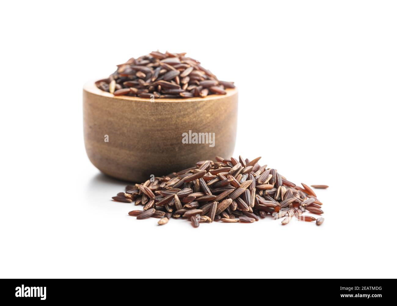 Uncooked red rice. Raw wild rice Stock Photo - Alamy