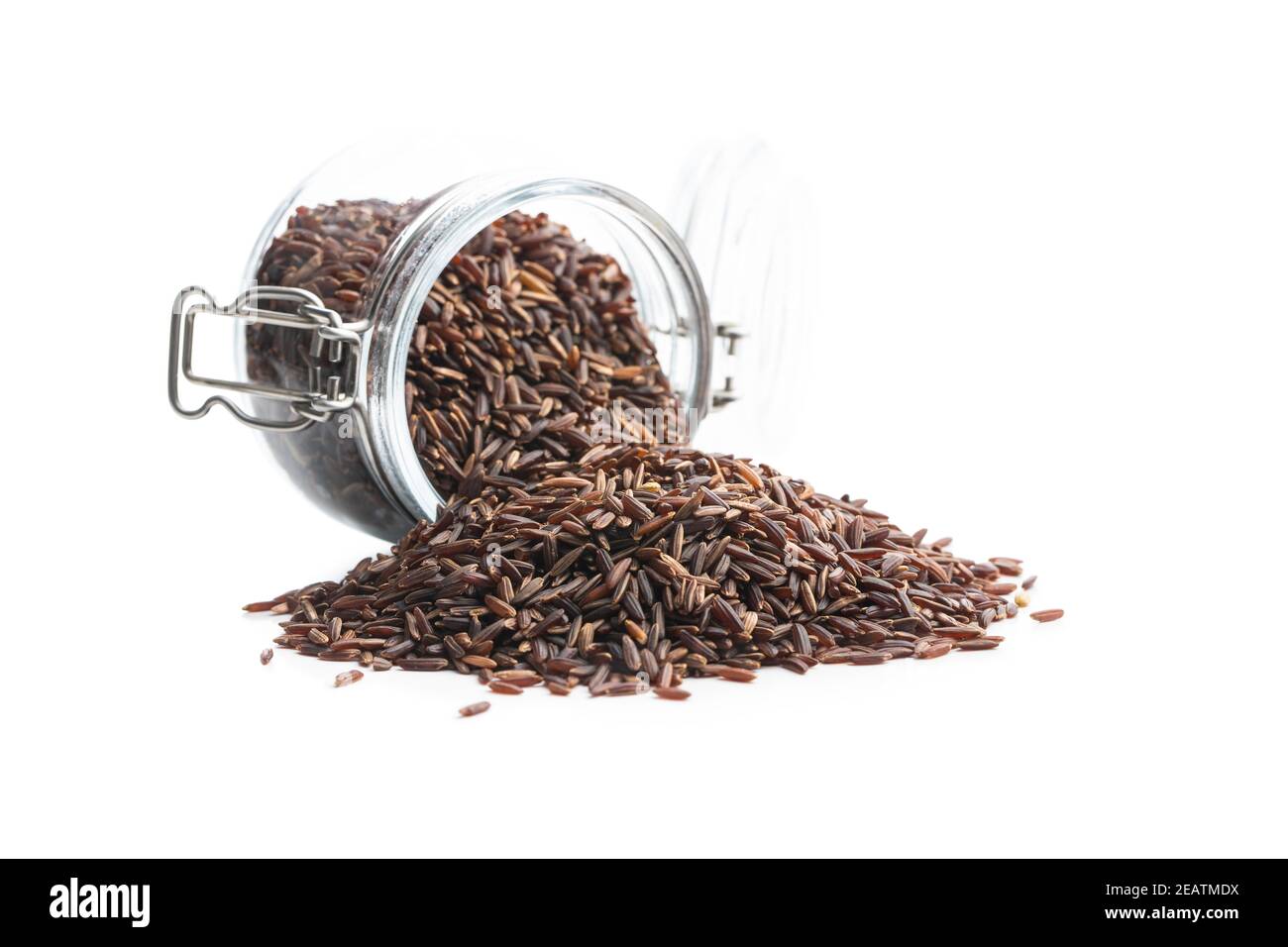 Uncooked red rice. Raw wild rice Stock Photo - Alamy