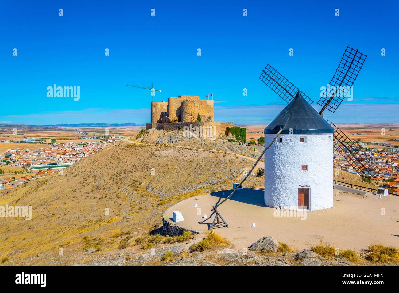 Traditional white windmills at Consuegra in Spain Stock Photo - Alamy