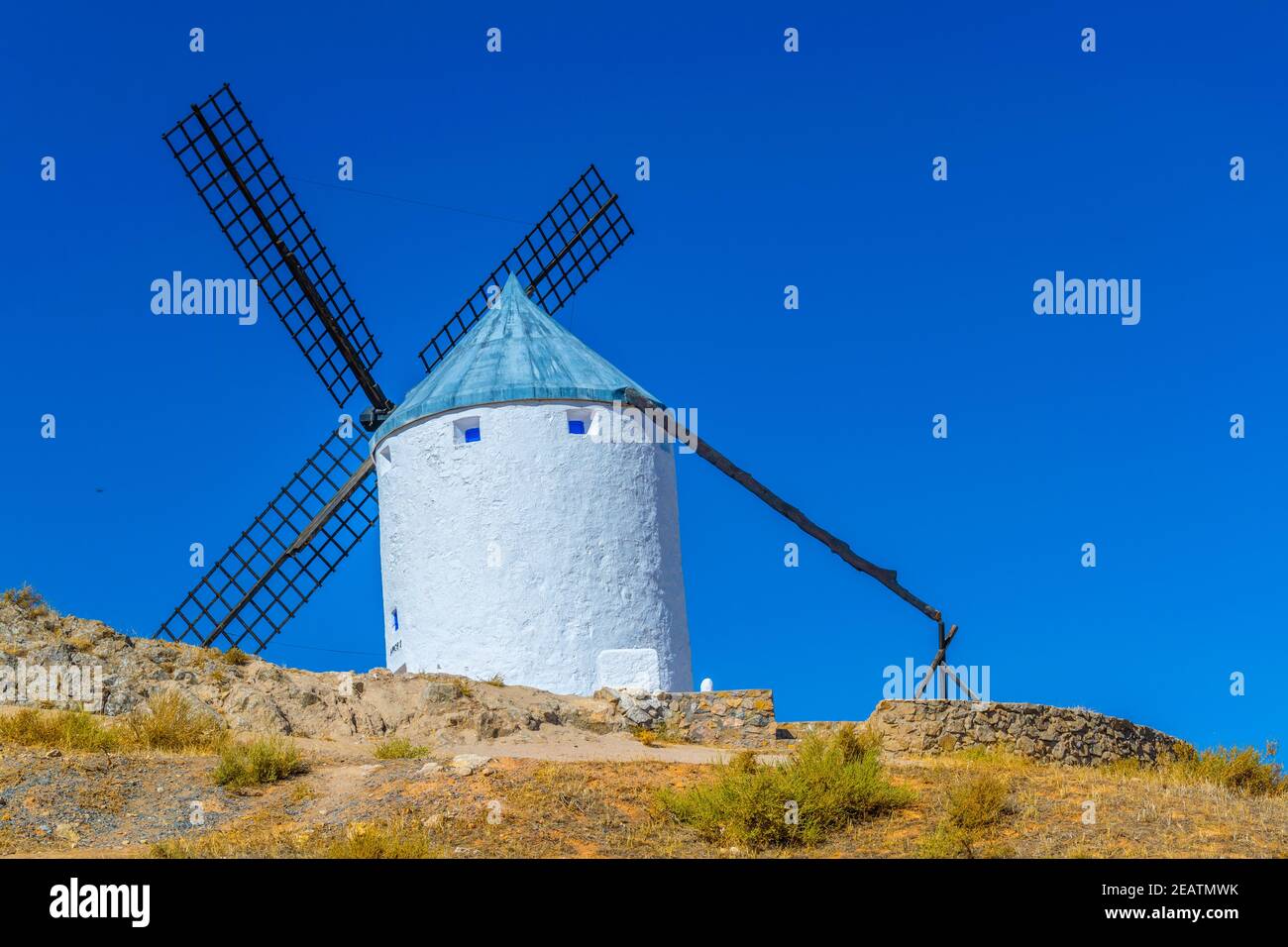 Traditional white windmills at Consuegra in Spain Stock Photo - Alamy