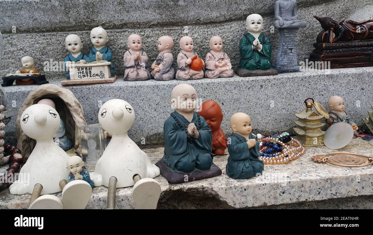 Buddha mini statue with beautiful background Stock Photo - Alamy