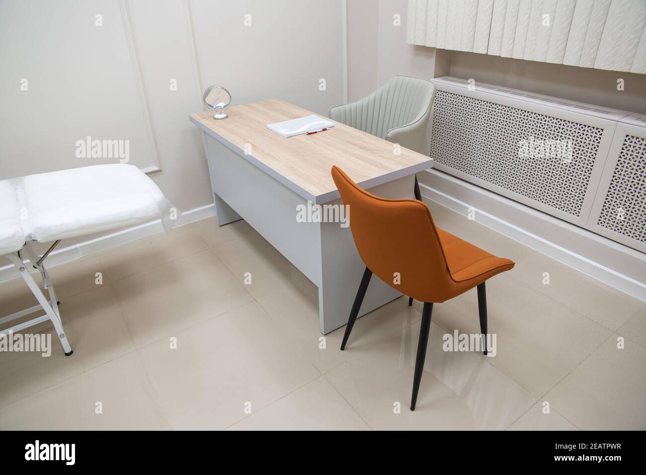 Modern interior of the cosmetology office with a full-electrical facial ...