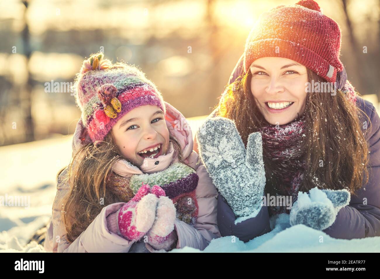 Family playing outside winter hi-res stock photography and images - Alamy