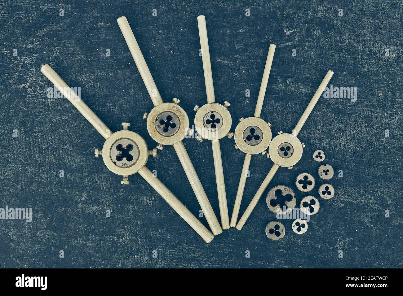 Threading dies, Old used kit for cutting an external thread, close up ...