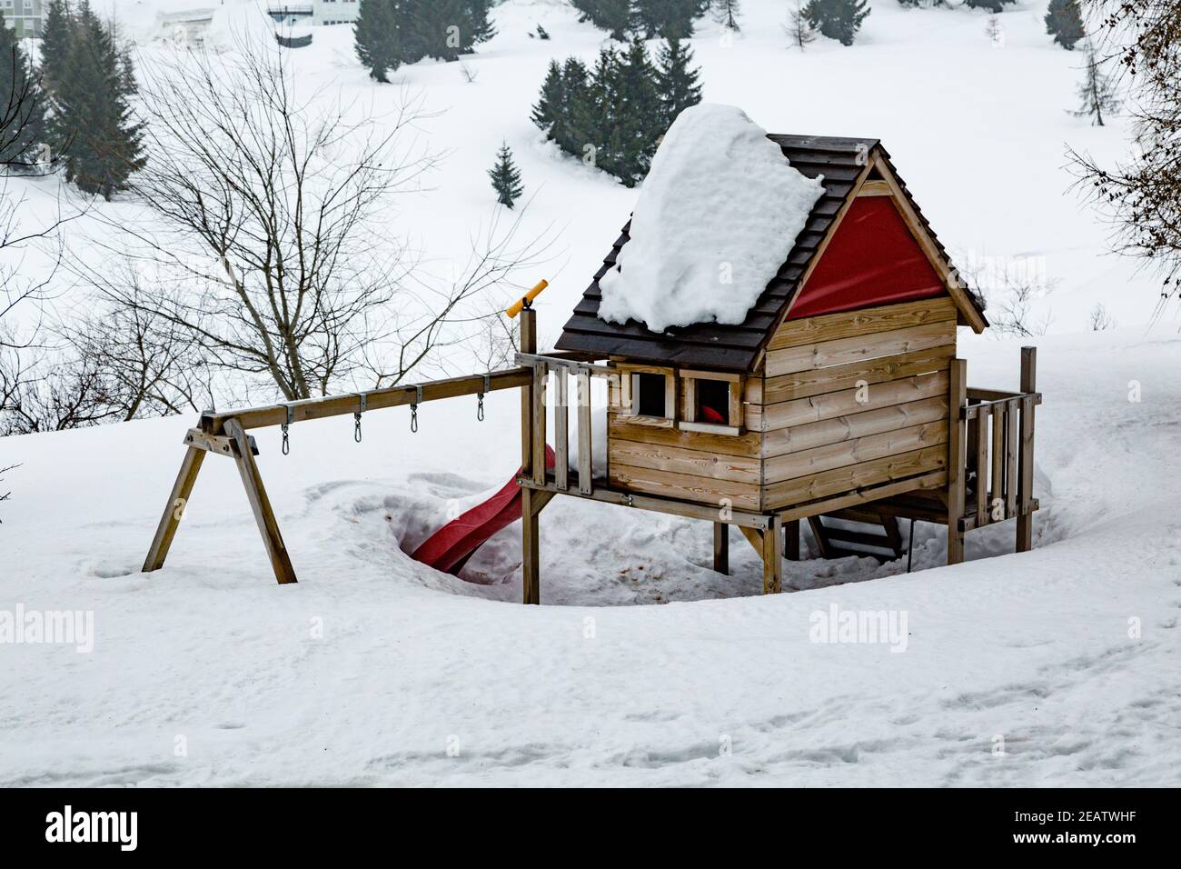 Small wooden cottage in the withe snow Stock Photo - Alamy