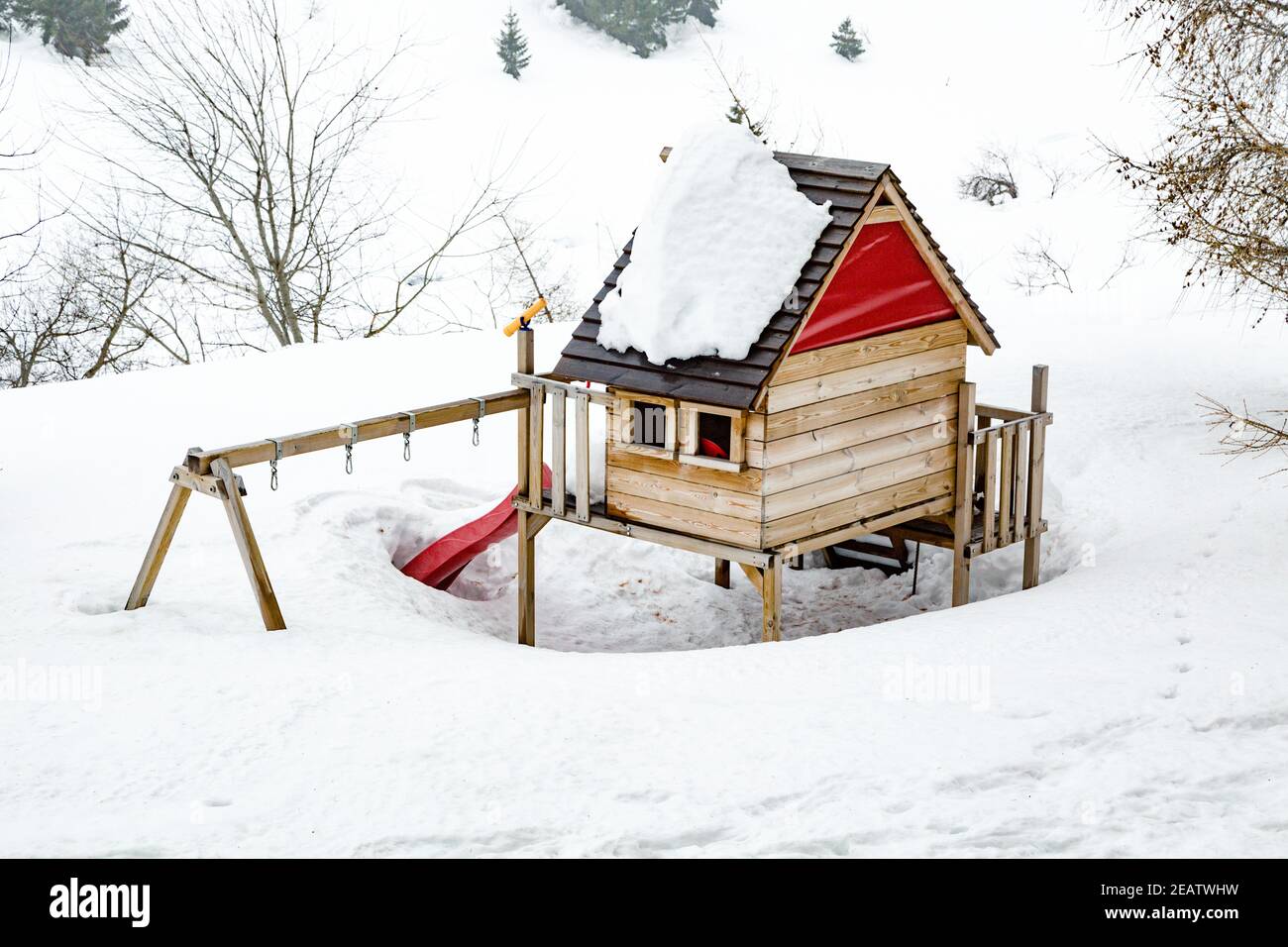 Small wooden cottage in the withe snow Stock Photo - Alamy