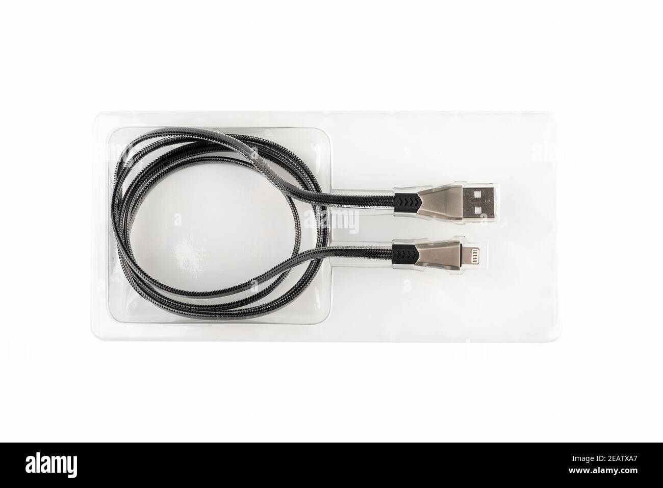 Top view of a data or charging cable with USB connectors in a blister ...