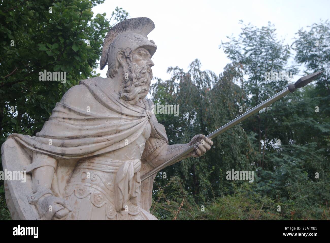 Human body ancient male statue made of white marble placed in a public ...