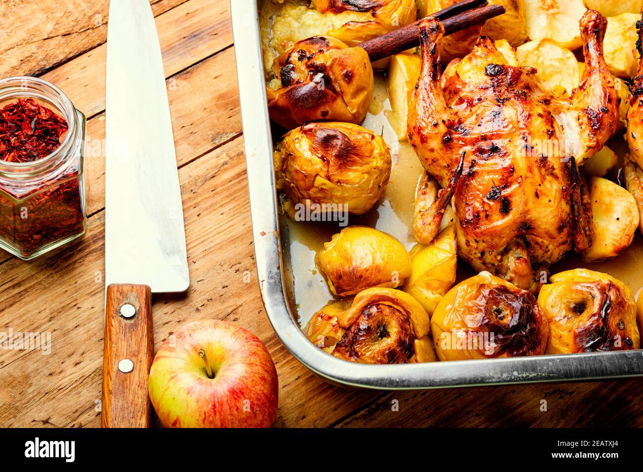 Roasted chicken with apples Stock Photo - Alamy