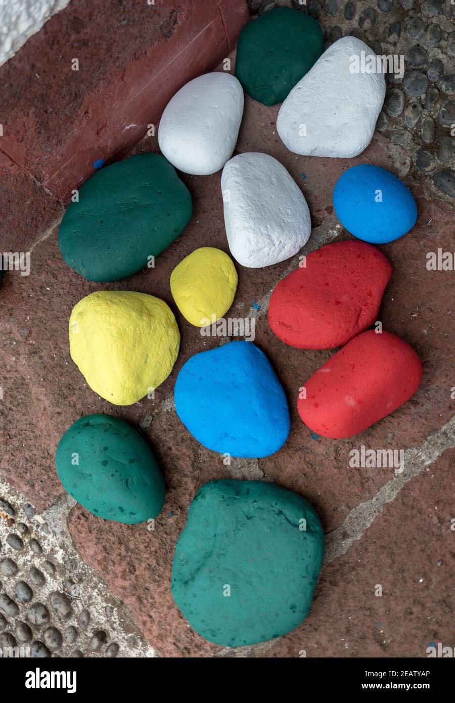 Color stones on a brown background Stock Photo - Alamy
