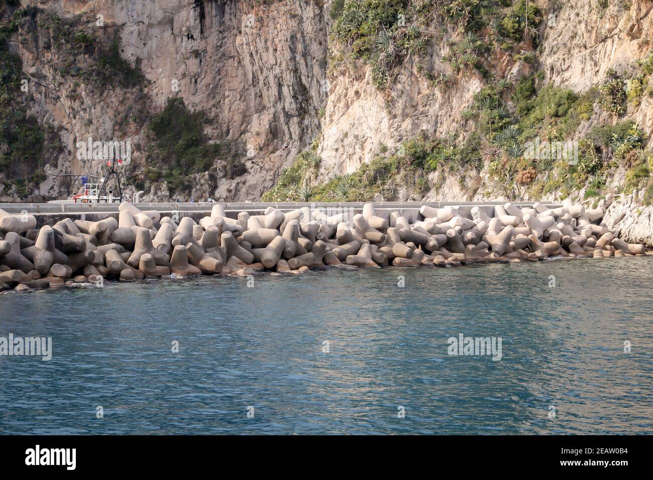 Concrete pylons as breakwaters and coastal protection at a port ...