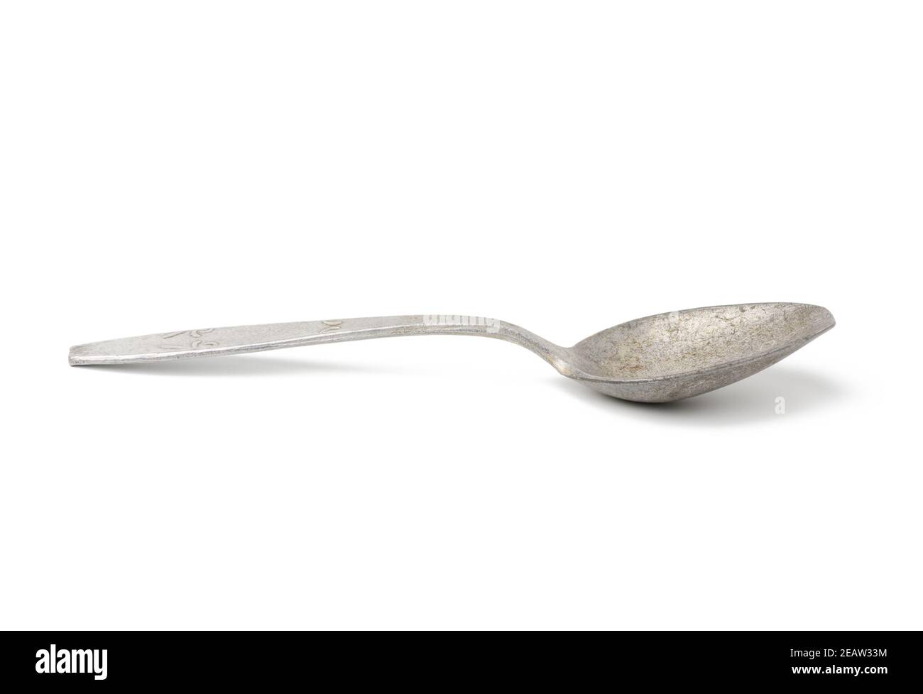empty aluminum spoon isolated on white background Stock Photo - Alamy