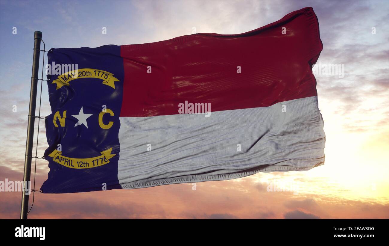 Flag of North Carolina waving in the wind against deep beautiful sky ...