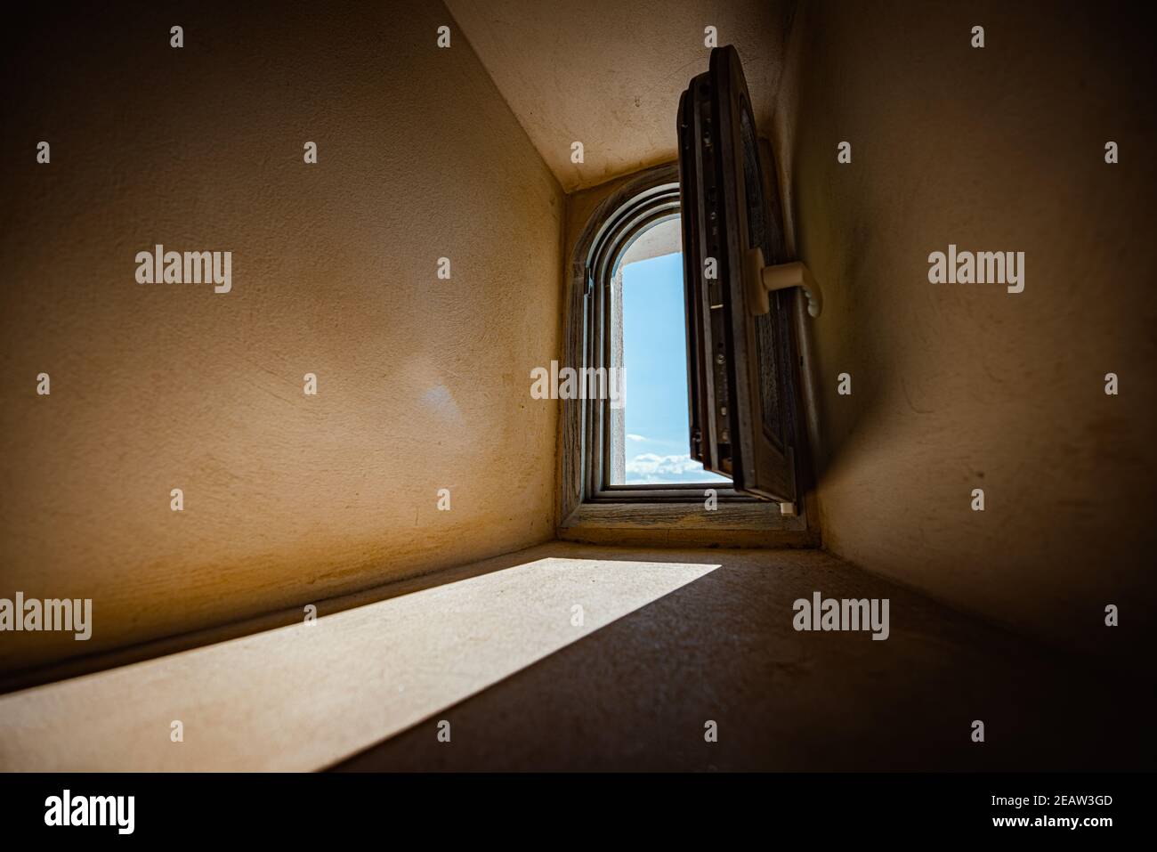 Small open window with sky and sun Stock Photo - Alamy