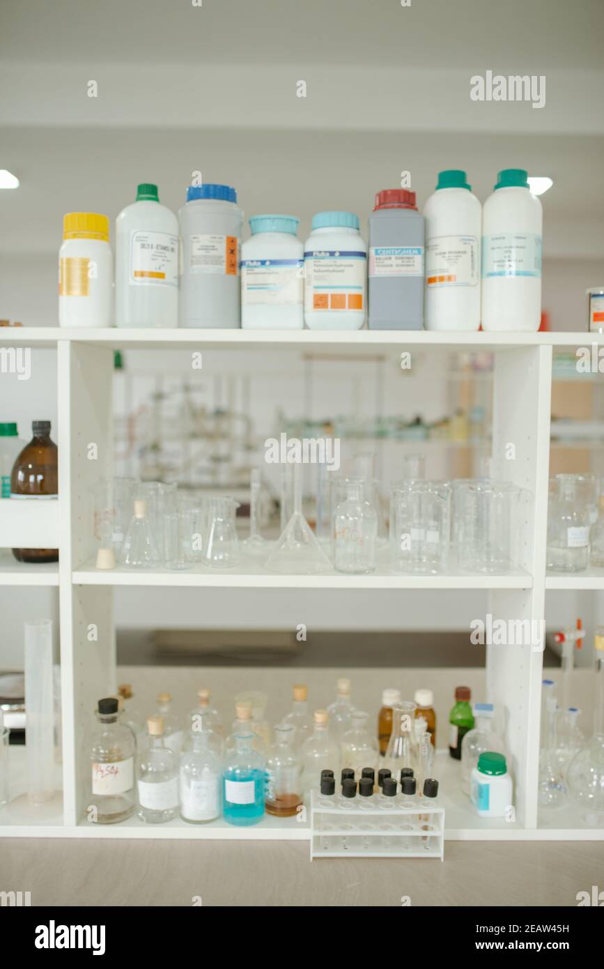 Test tubes in a laboratory on shelves Stock Photo - Alamy