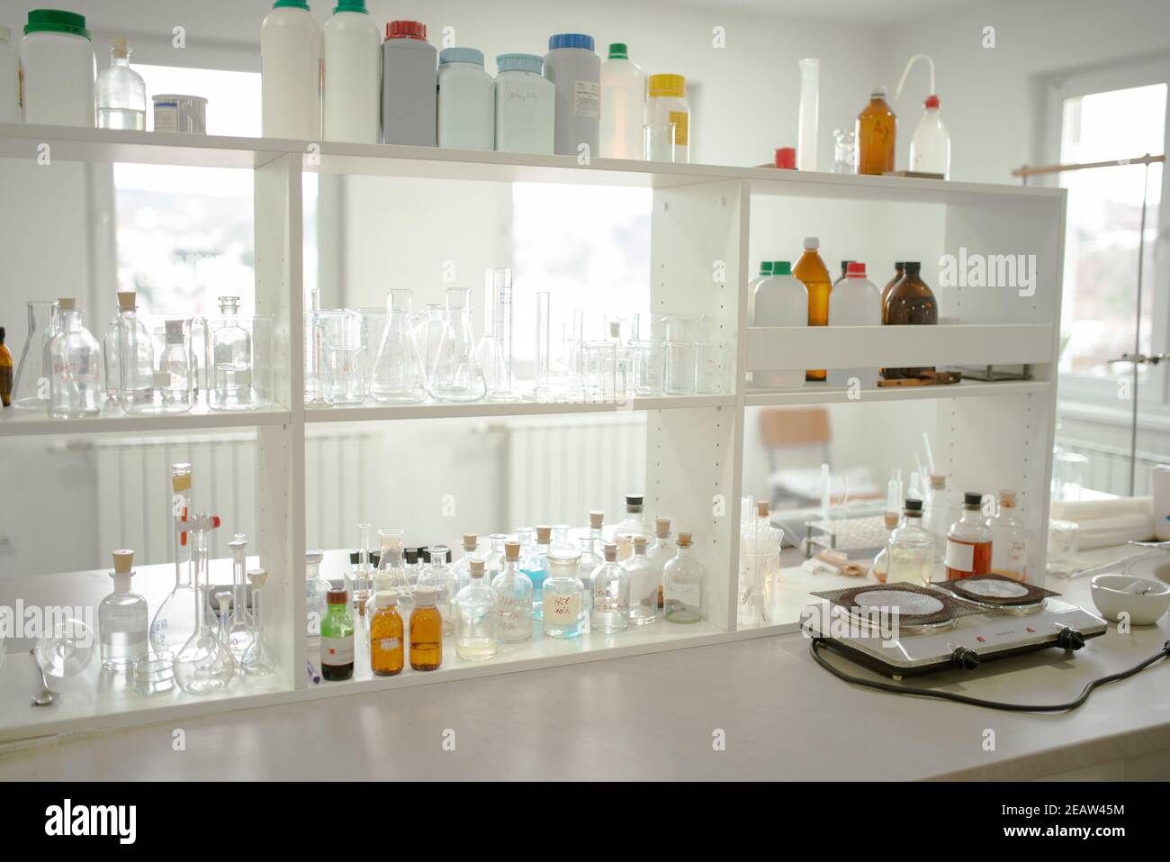 Test tubes in a laboratory on shelves Stock Photo - Alamy