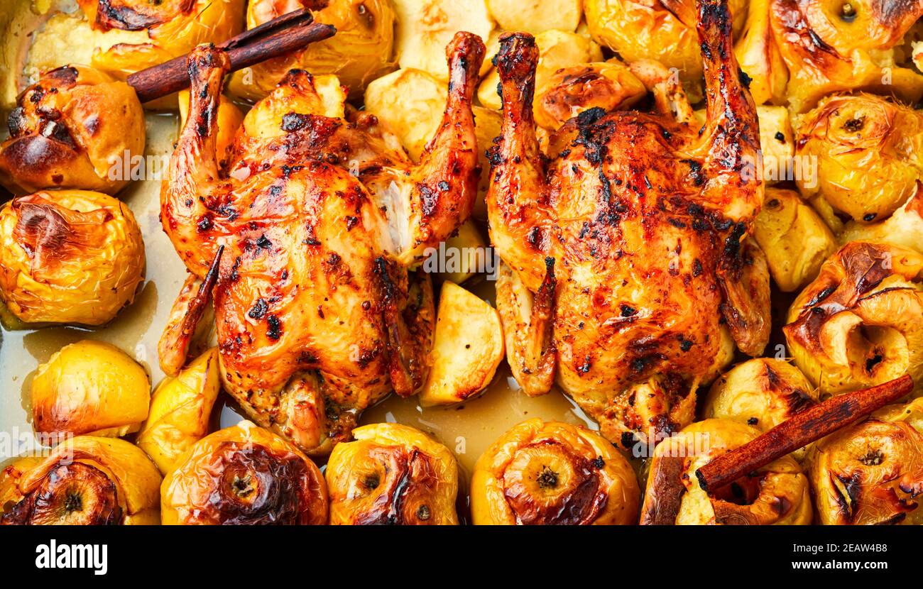 Baked partridge with apple Stock Photo - Alamy