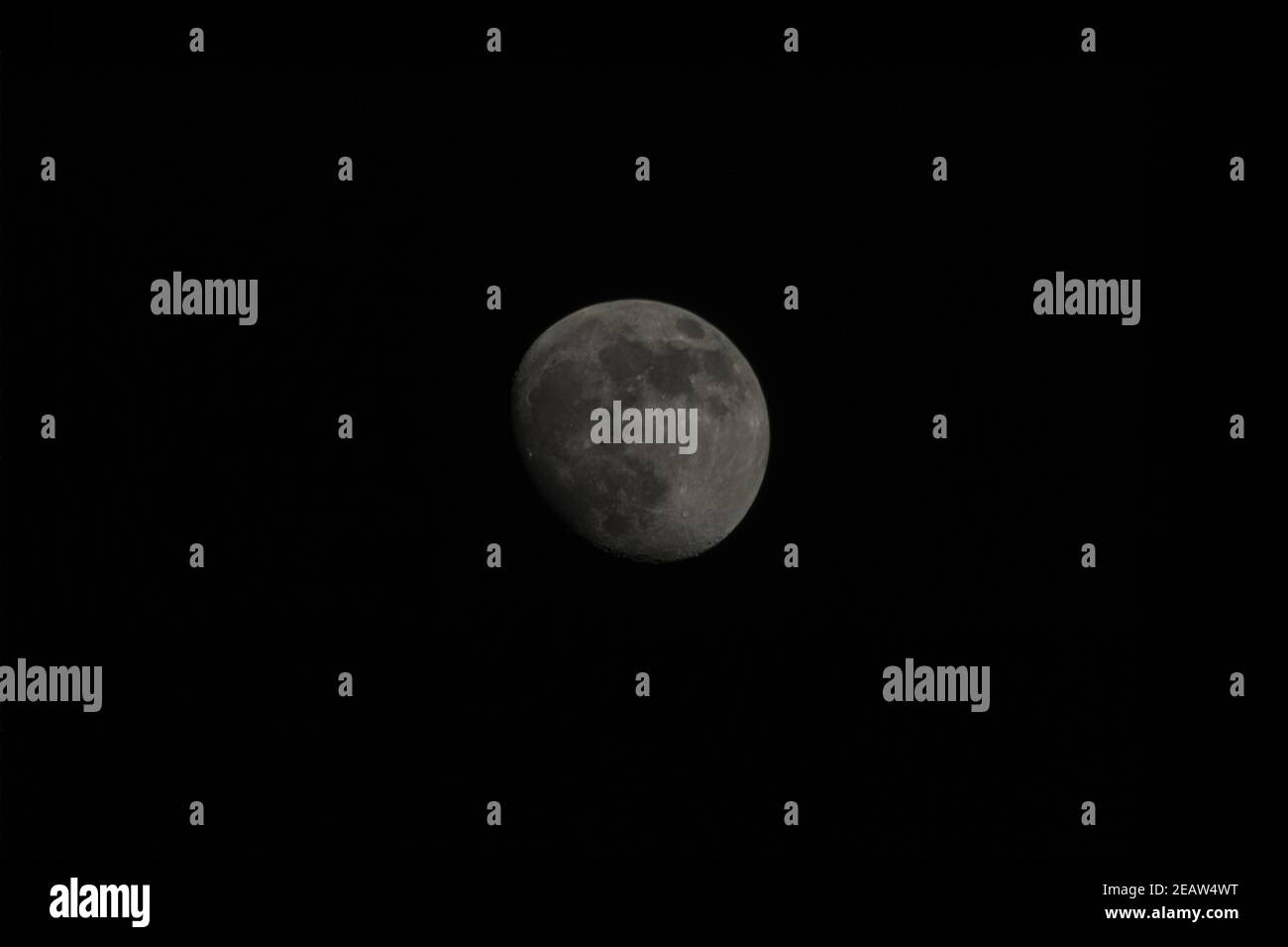 Mesmerizing view of the moon gleaming in the night sky - great for ...