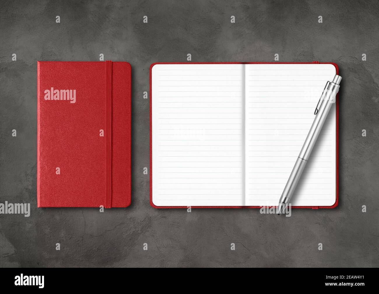 Dark red closed and open lined notebooks with a pen on black concrete ...