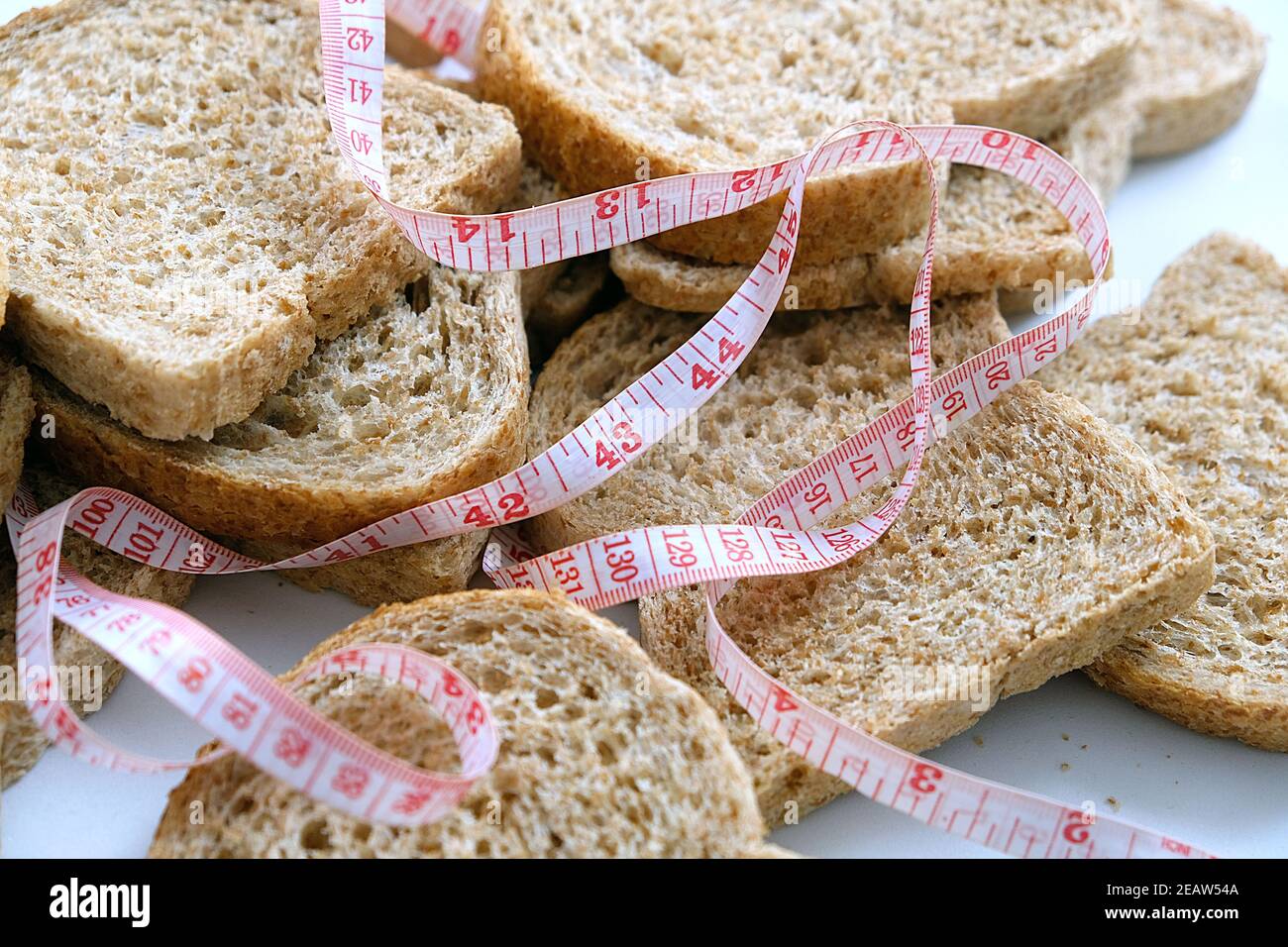 slices of bran bread with a tape measure, ideal bran bread for weight ...
