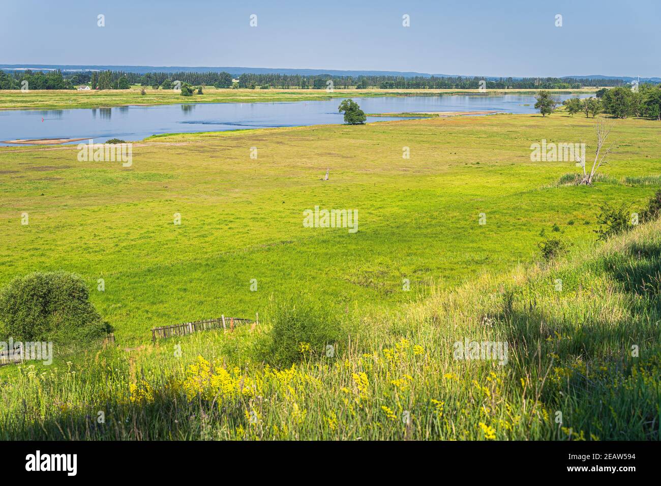 Summer rural landscape with agriculture fields on a bank of a river ...