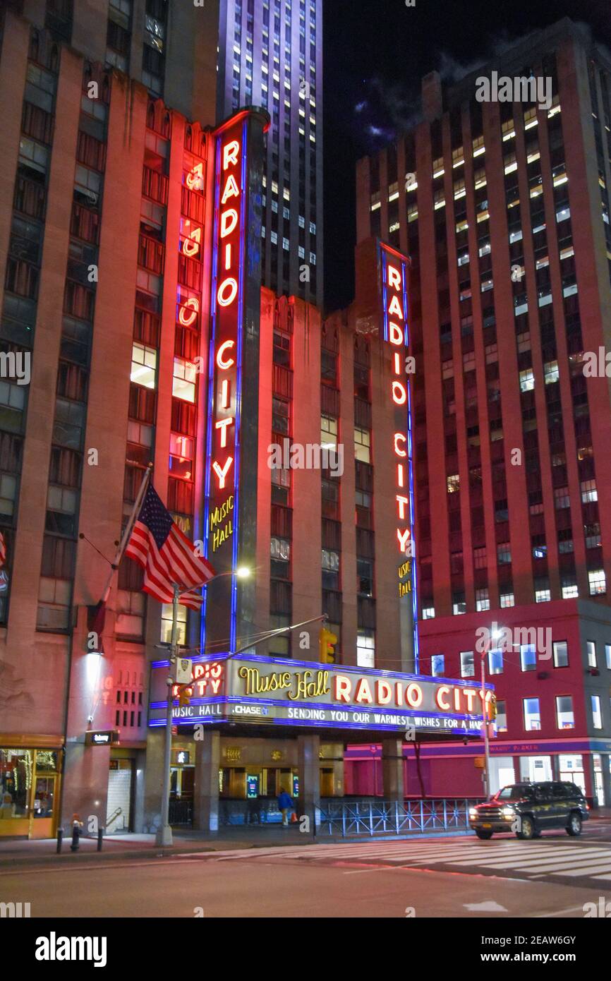 The iconic Radio City Music Hall sign at night Stock Photo - Alamy