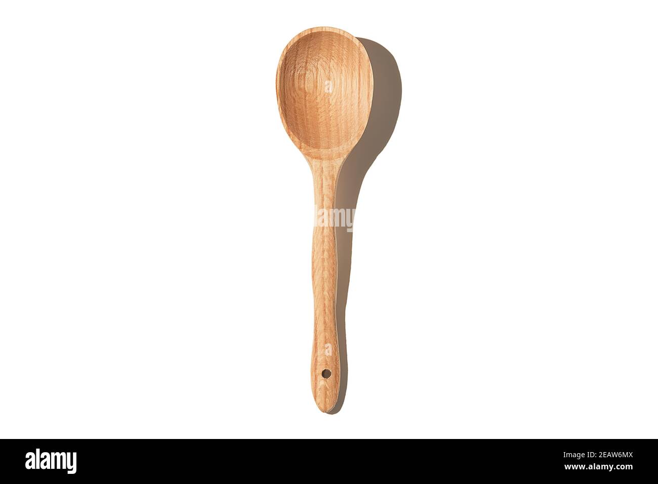 Wooden textured spoon isolated on a white background Stock Photo - Alamy
