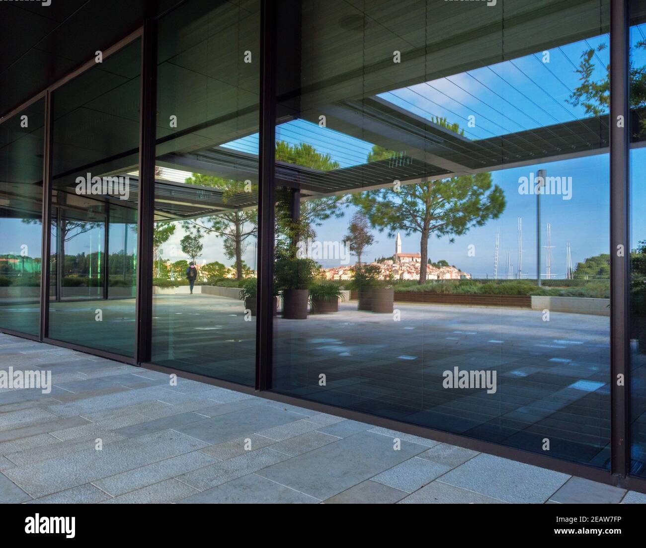 Reflection of rovinj on a glass house front Stock Photo - Alamy