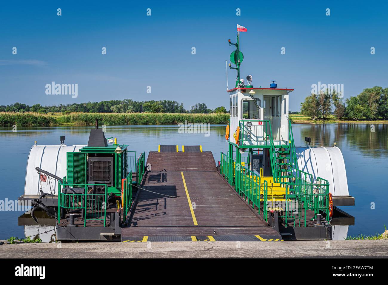 Vintage paddle steamer ferry operating on Oder River crossing between ...