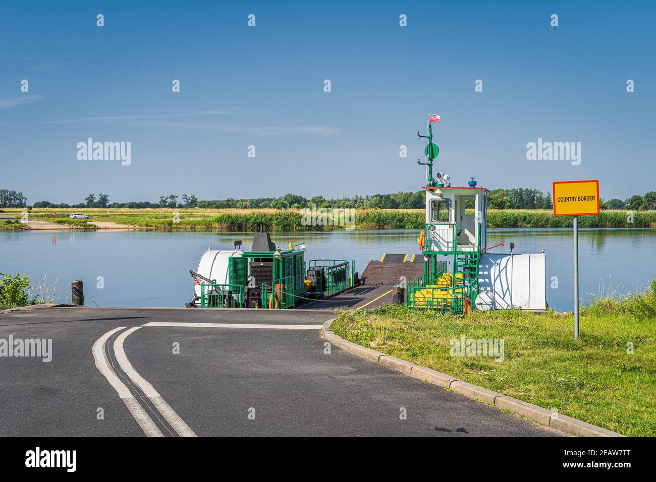 Vintage paddle steamer ferry operating on Oder River crossing between ...