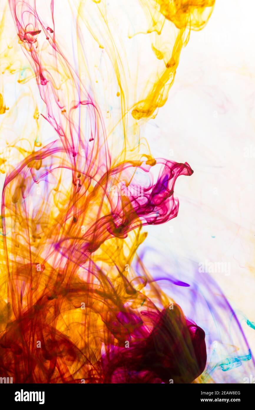 Acrylic colors and ink in water. Abstract background Stock Photo - Alamy