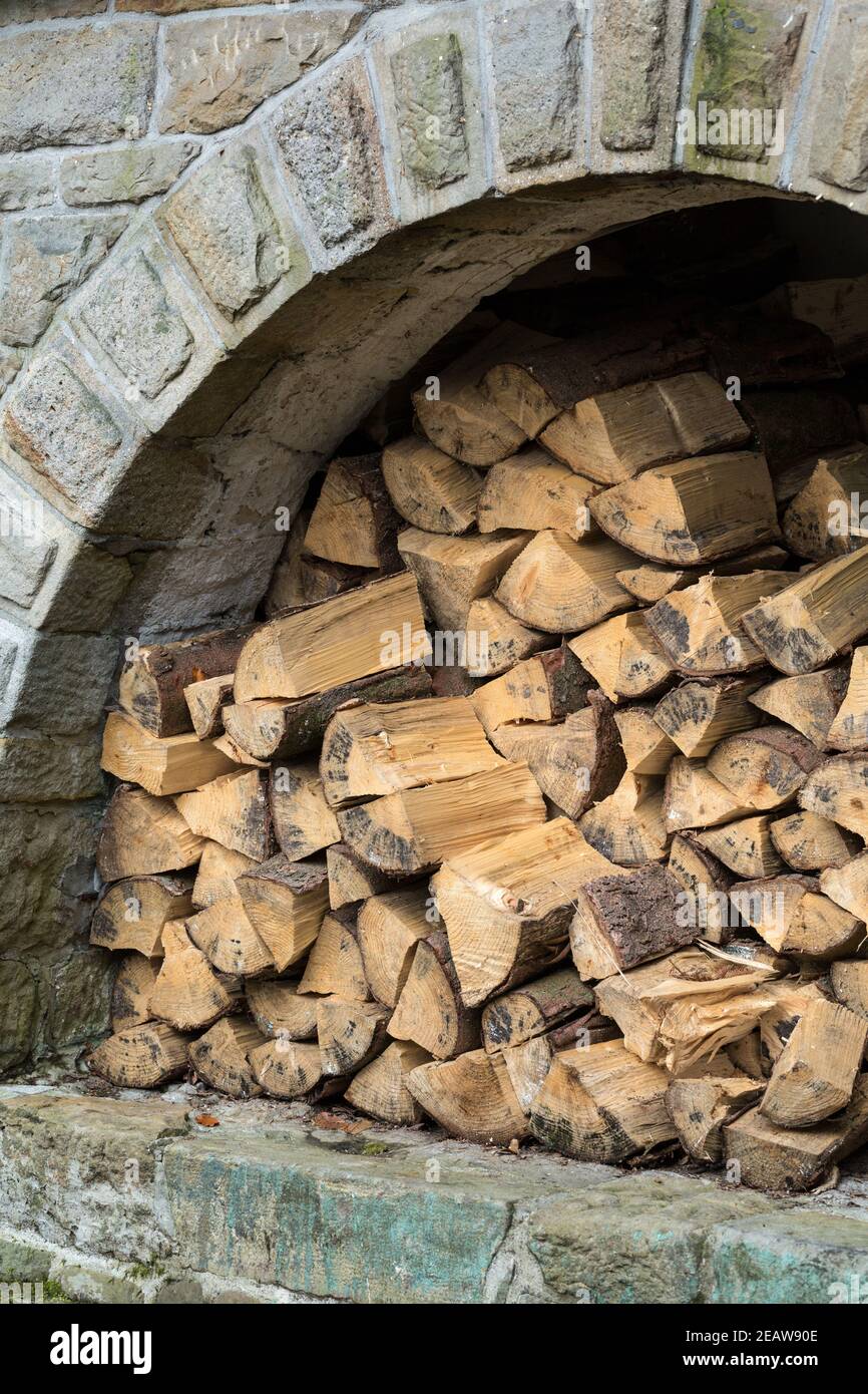 chopped firewood on a stack Stock Photo - Alamy