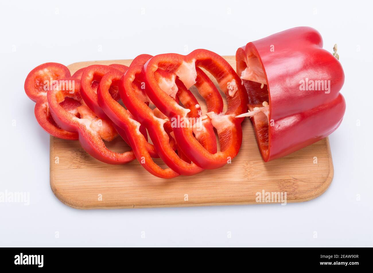 Sliced red pepper isolated on white background Stock Photo - Alamy
