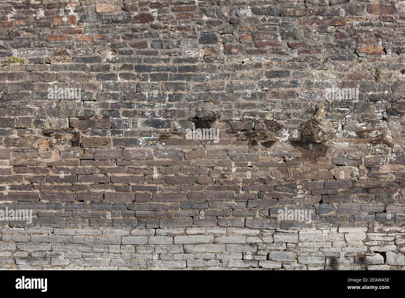 weathered distressed red brick wall texture background Stock Photo - Alamy