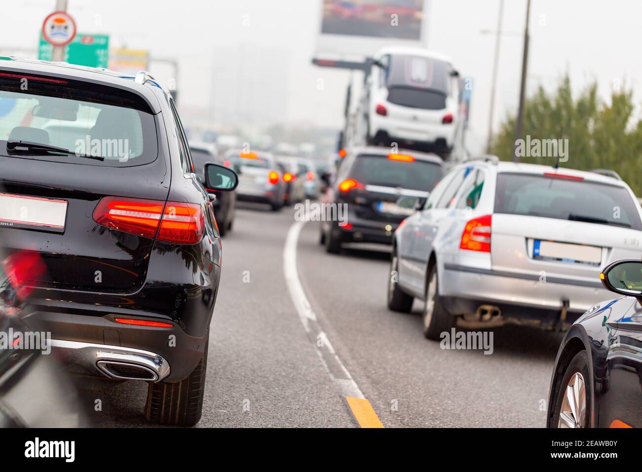 Line of cars and truck standing on road in rush hour Stock Photo - Alamy