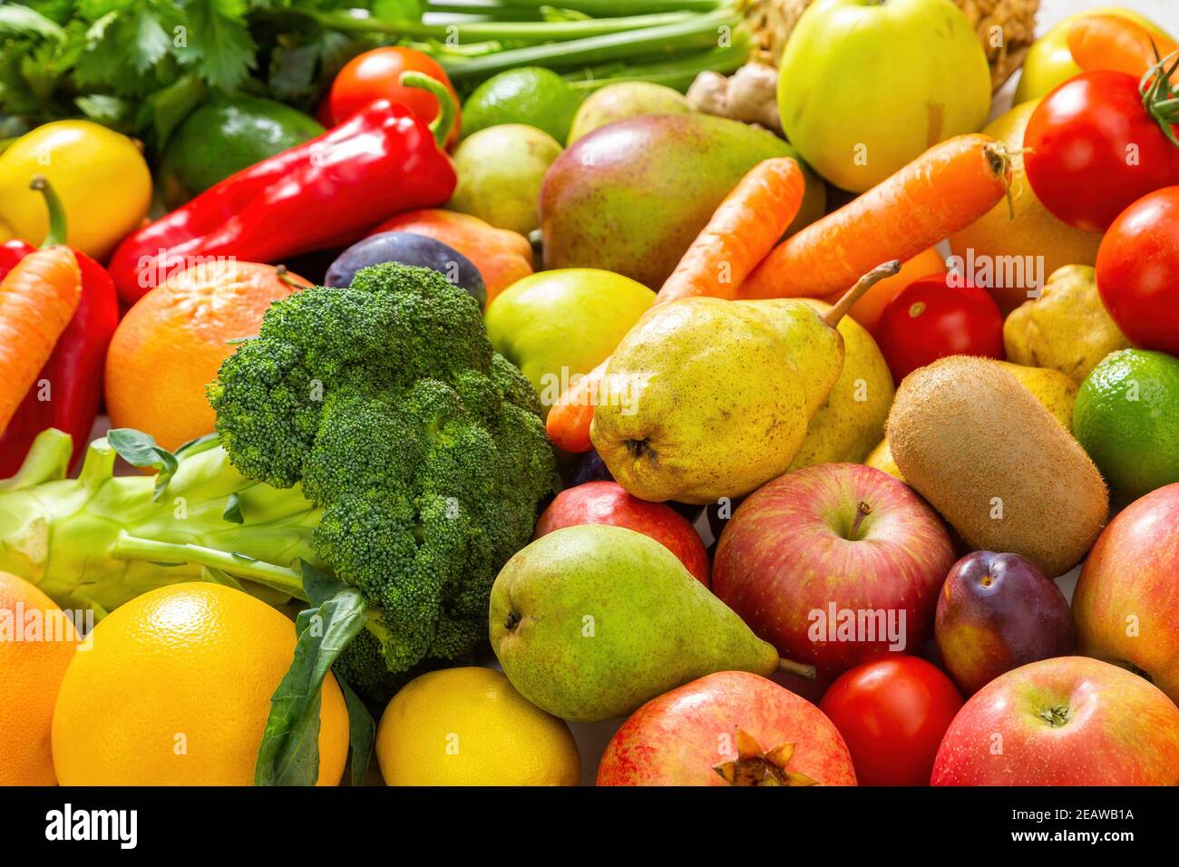 Assorted fresh raw fruit and vegetable in close up Stock Photo - Alamy