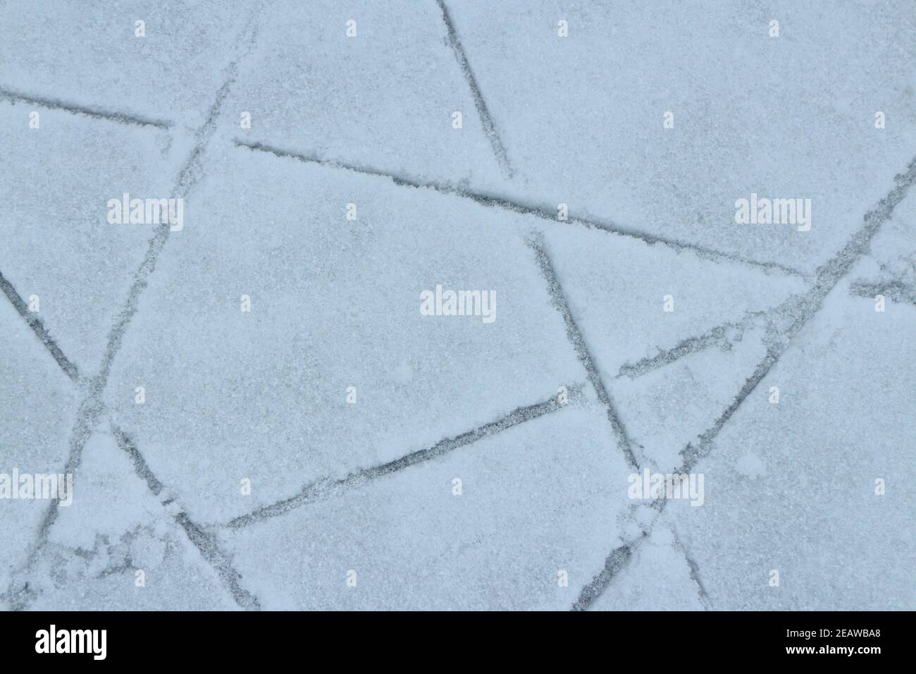 ice lined with skate tracks background Stock Photo - Alamy