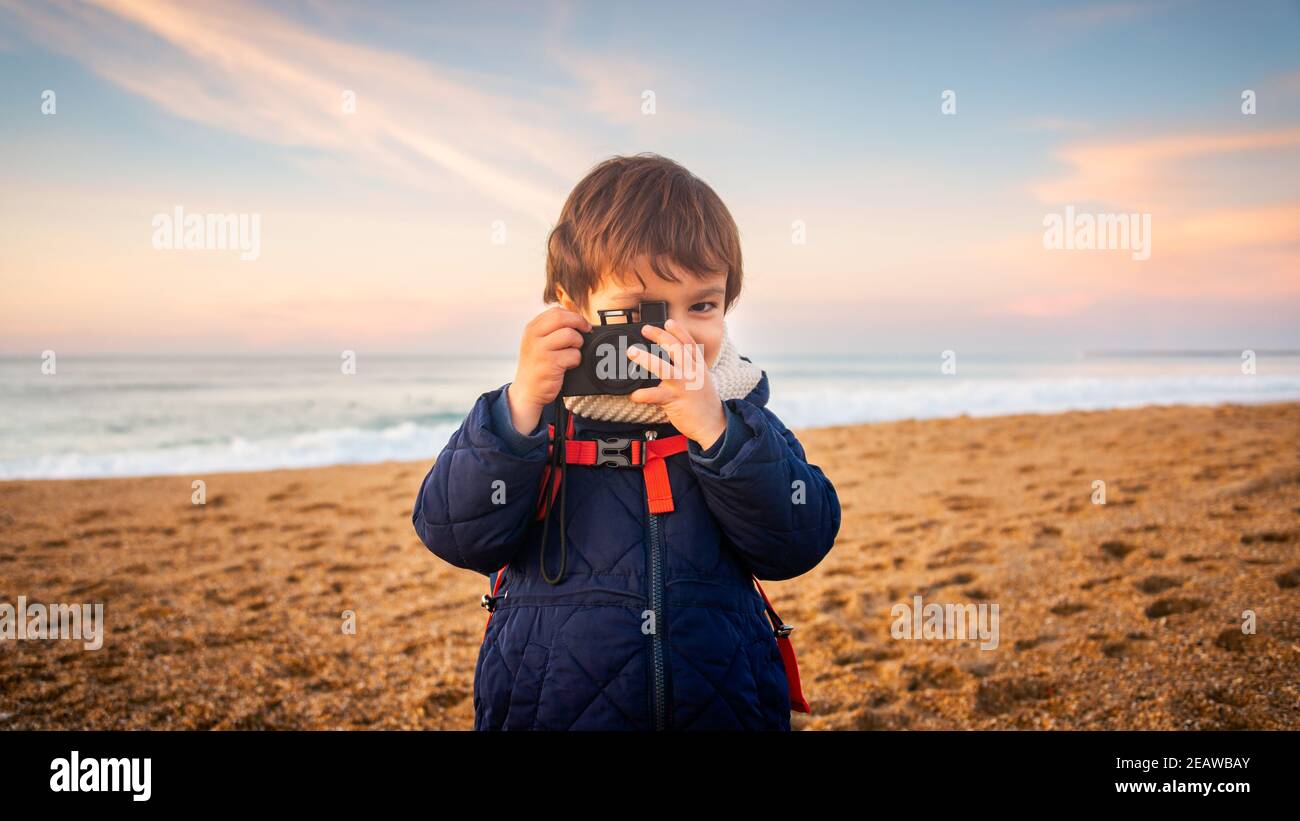 Boy playing at sunset hi-res stock photography and images - Alamy