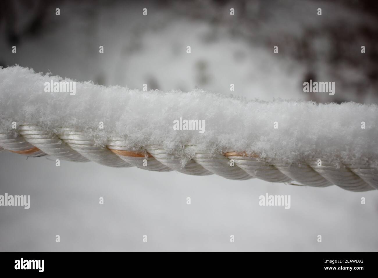 Rope in snow hi-res stock photography and images - Alamy
