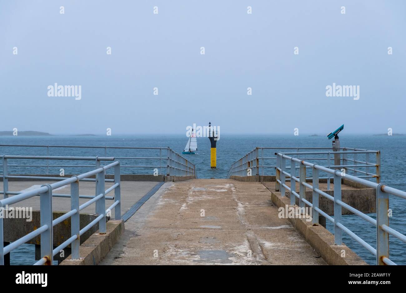 Roscoff, France - August 28, 2019: The beacon of pontoon jetty. Ferry ...