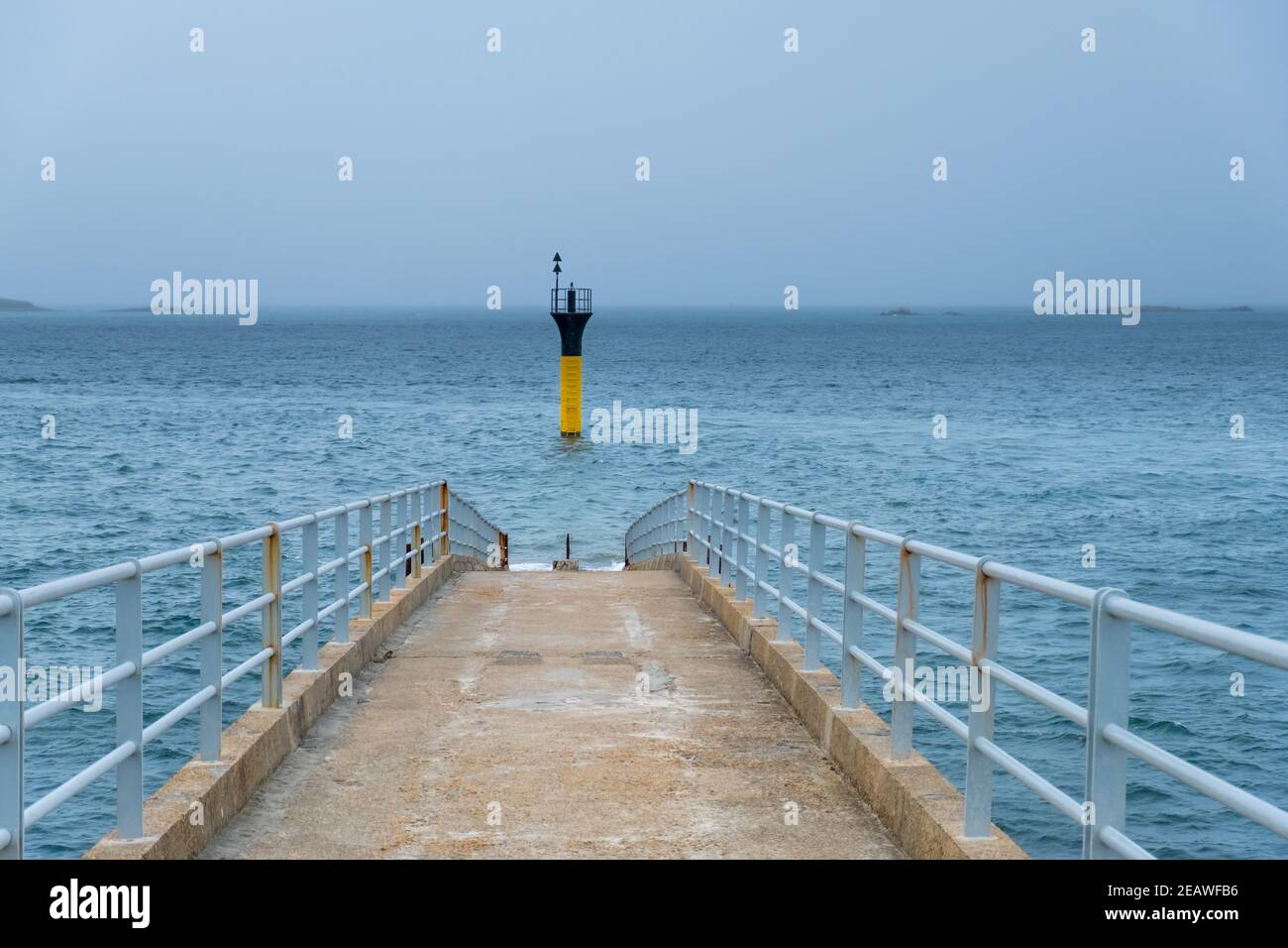 Roscoff, France - August 28, 2019: The beacon of pontoon jetty. Ferry ...