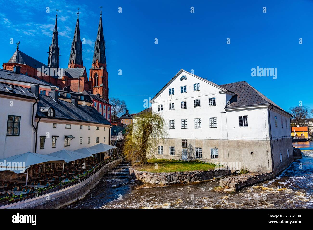 White building of Uppland museum and cathedral in Uppsala, Sweden Stock ...