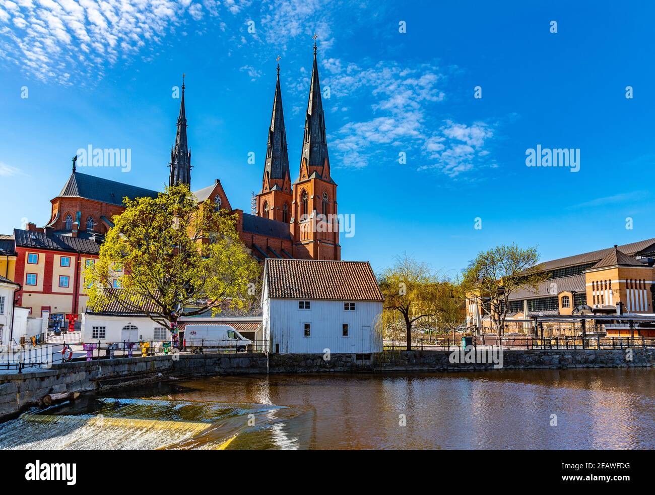 Uppsala cathedral reflecting on river Fyris in Sweden Stock Photo - Alamy